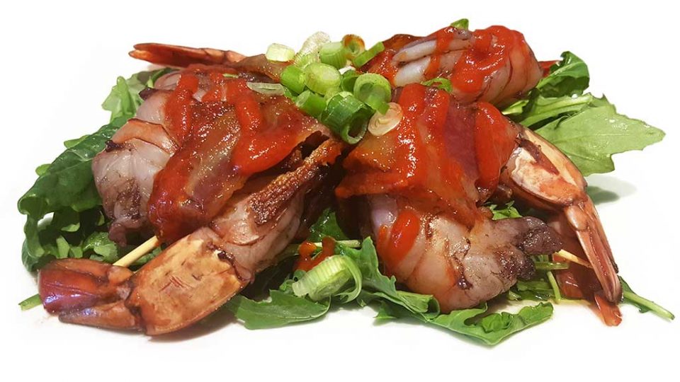 Merlot recipe: Truffled bacon wrapped prawns with Honey Whisky Glaze